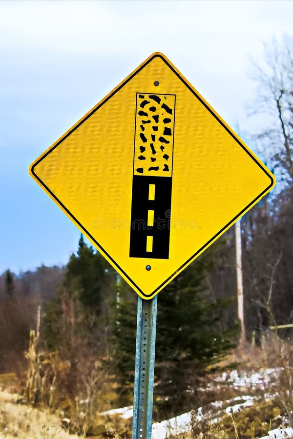 Yield To Oncoming Traffic Construction Sign on the Road Stock Image ...