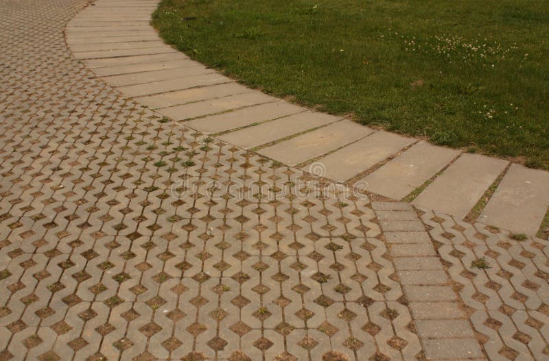 Pavement and green grass. stock photo. Image of shape - 66337700