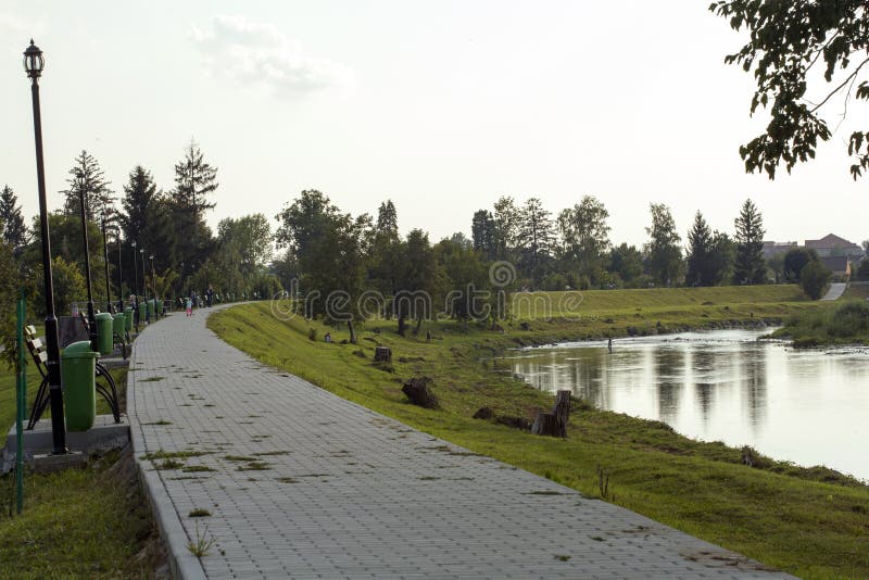 River bench pavement stock photo. Image of park, river - 99695644