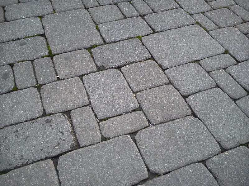 A Pavement Made of Rectangular Stone Slabs Stock Photo - Image of ...
