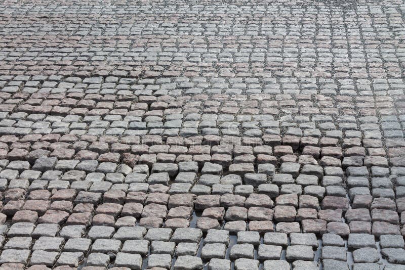 Pavement Made of Natural Stone in the Form of Tiles Stock Image - Image ...