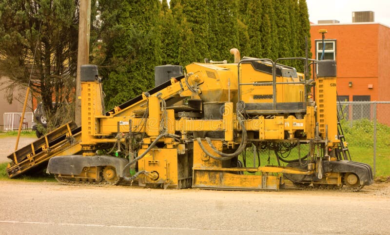 A Pavement Spreader in Canada Editorial Photography - Image of paver ...