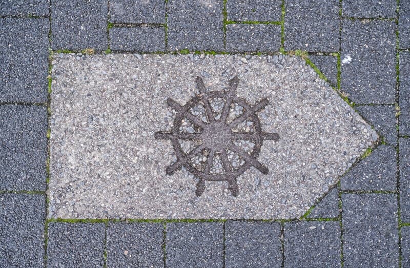 Pavement Stone with Steering Wheel Design Stock Photo - Image of gray ...