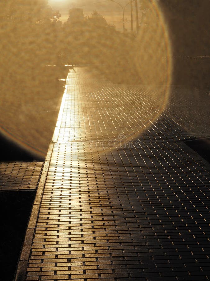 Pavement sun road stock image. Image of stone, brick - 100211539