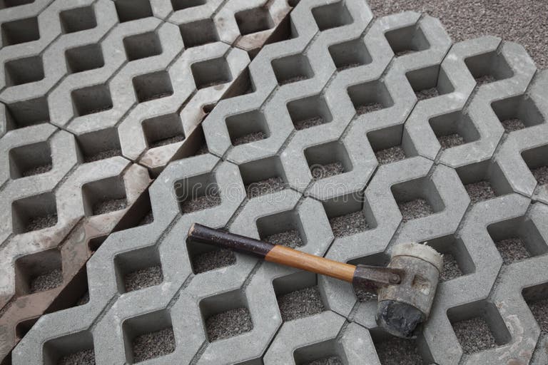 Paving blocks and mallet stock image. Image of construction - 14936661
