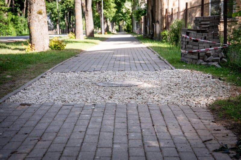 Paving Bricks Piled by Sidewalk, Construction Work Stock Image - Image ...