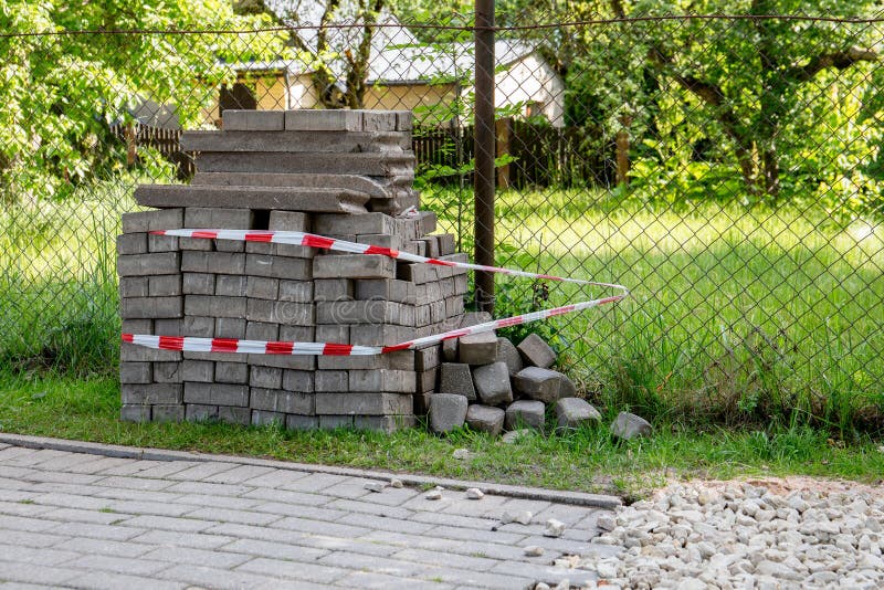 Paving Bricks Piled by Sidewalk for Renovation Work Stock Image - Image ...