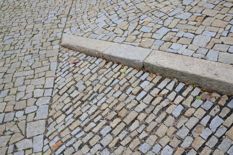 Paving Composed of Different Types of Stone Cubes and Tiles Stacked in ...
