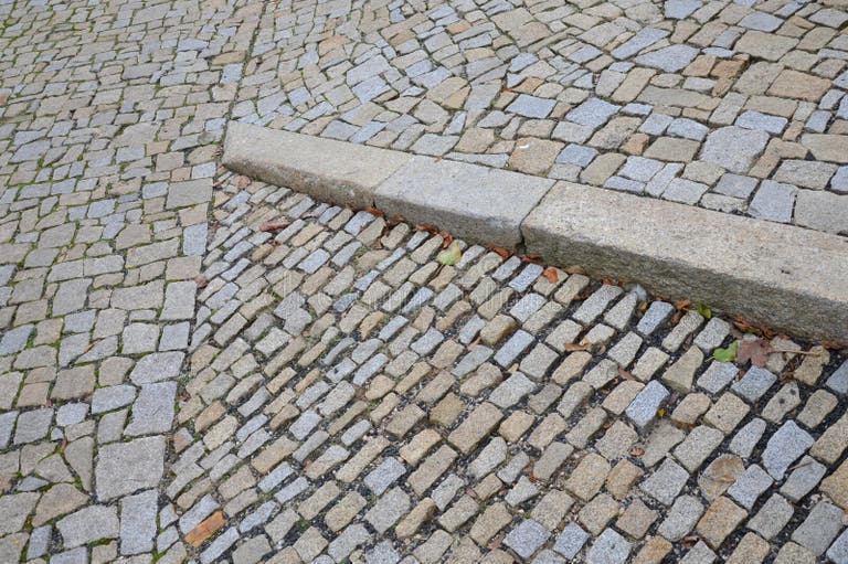 Paving Composed of Different Types of Stone Cubes and Tiles Stacked in ...