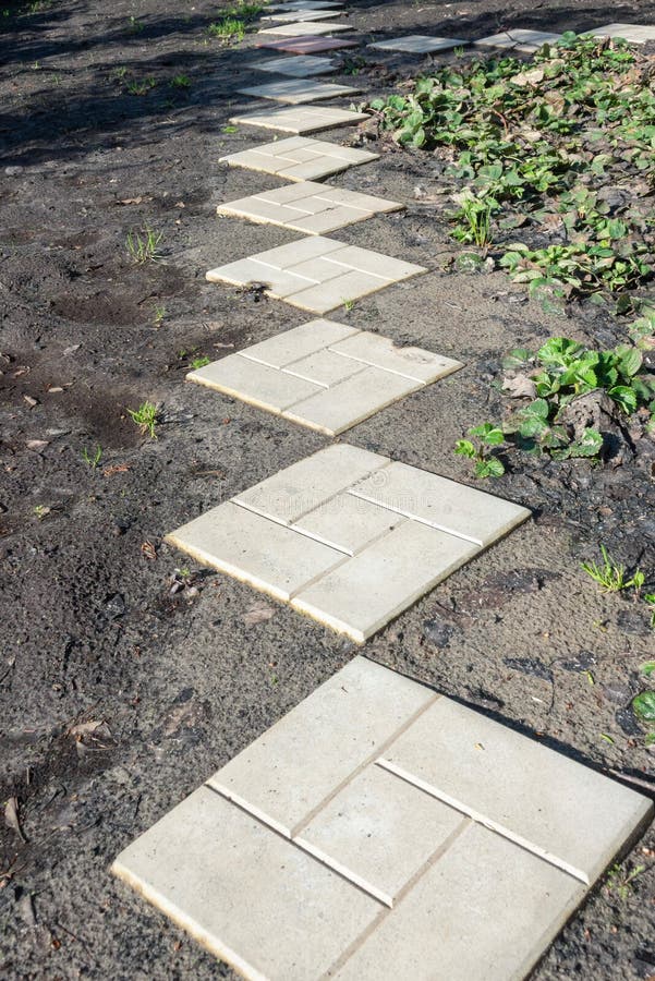 Paving Concrete Tile Garden Path in Bright Sunshine. Stock Photo ...