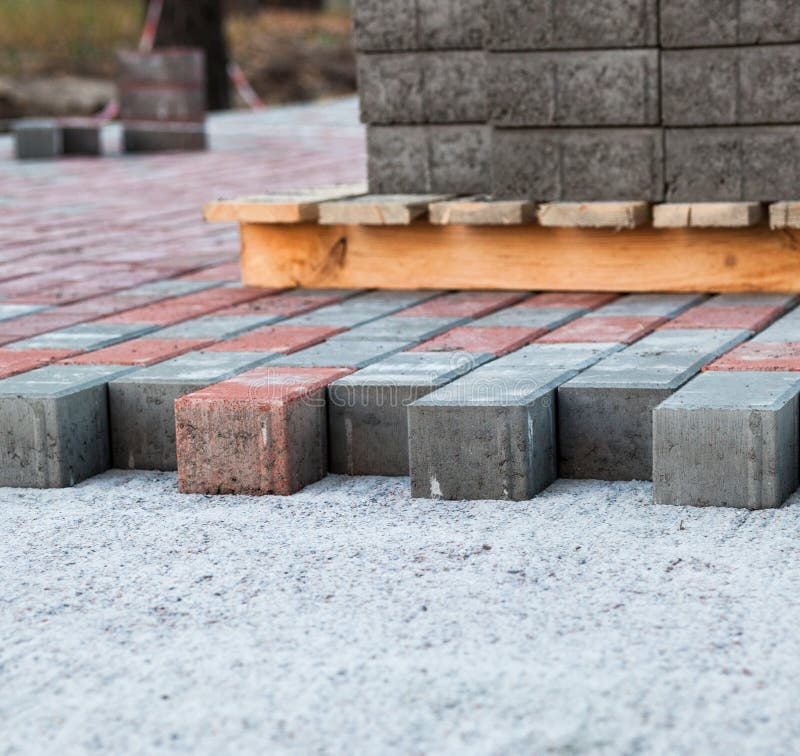 Paving the footpath stock image. Image of foot, material - 183437609