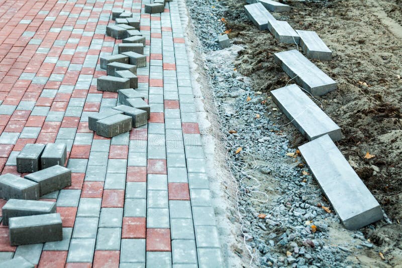 Paving the footpath stock photo. Image of building, foot - 184176206