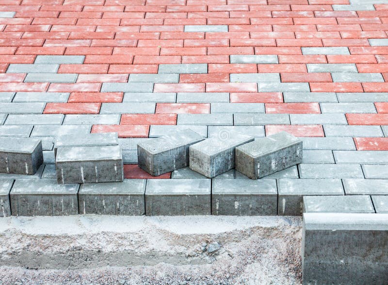 Paving the footpath stock image. Image of foot, material - 183437609