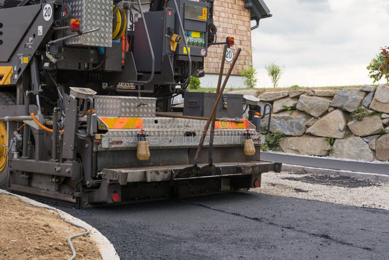 Paving machine in use editorial image. Image of covering - 74283825