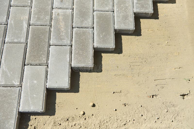 Paving Slabs on Sand during the Construction Process Stock Image ...