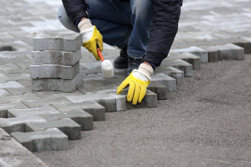 Paving stone worker stock image. Image of bricklayer - 80628825