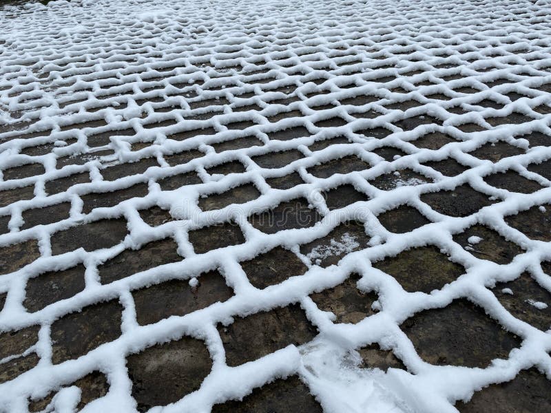 Paving stones with snow stock image. Image of ground - 258568073