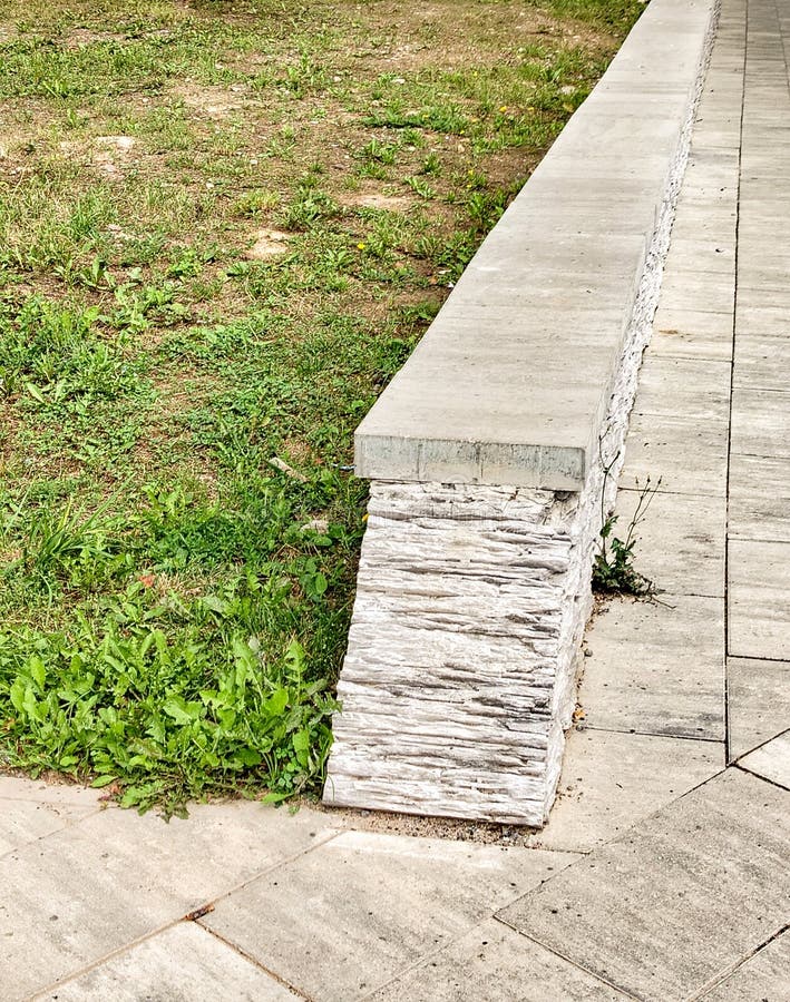 Paving Tile with High Fence in the Form of a Parapet, Close-up ...