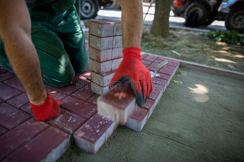 Paving Work for Laying a New Pedestrian Path is Being Done in the ...