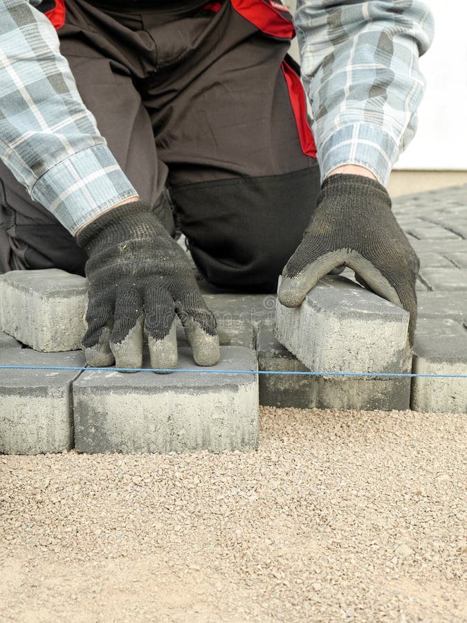 Laying Paving Bricks on Soil Stock Photo - Image of outdoors, brick ...