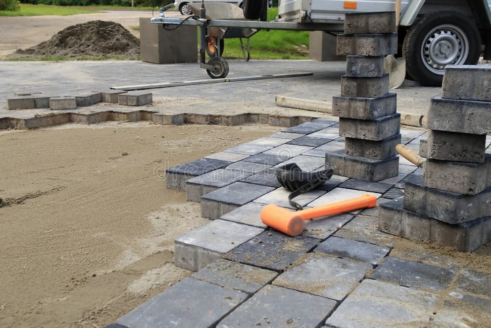 Paving works. stock photo. Image of brickwork, flooring - 257743354