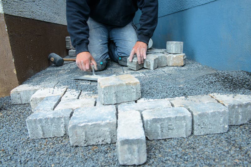 Pavior stock photo. Image of hand, pavement, concrete - 40558610