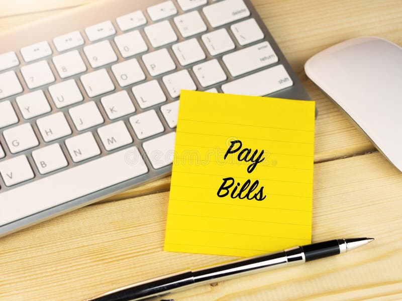 Pay Bills Text on Sticky Note on Work Desk, Payment Reminder Con Stock ...