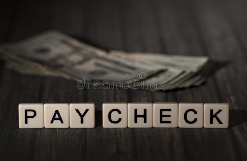Pay Check stock photo. Image of table, little, wooden - 94993870