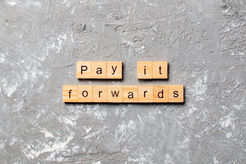 Pay it Forward Word Written on Wood Block. Pay it Forward Text on ...