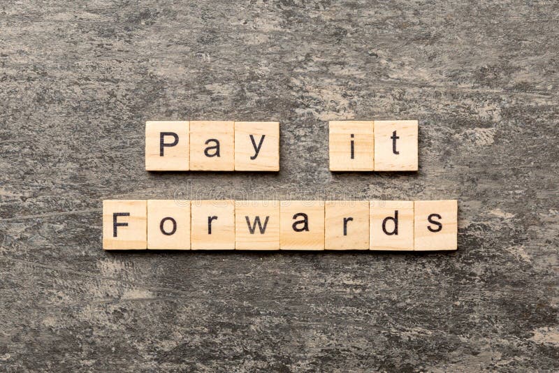 Pay it Forward Word Written on Wood Block. Pay it Forward Text on ...