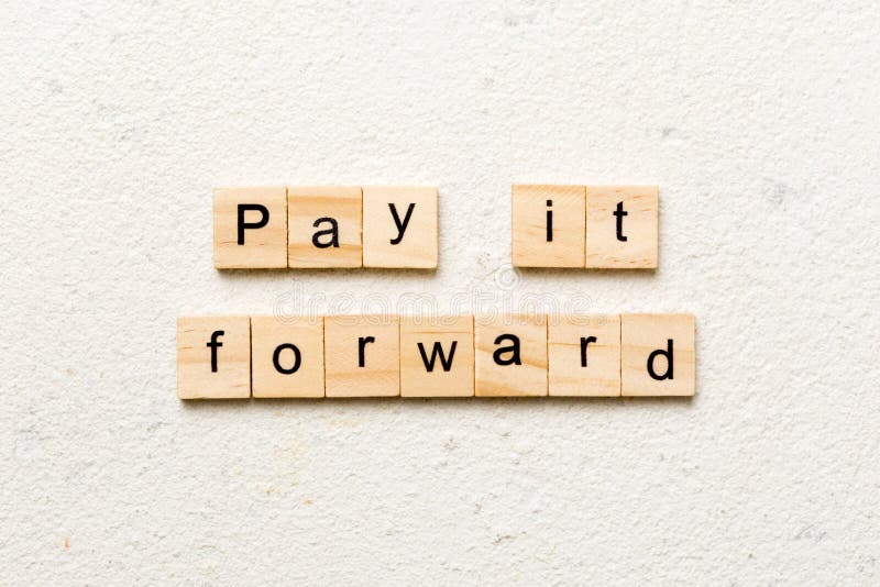 Pay it Forward Word Written on Wood Block. Pay it Forward Text on ...