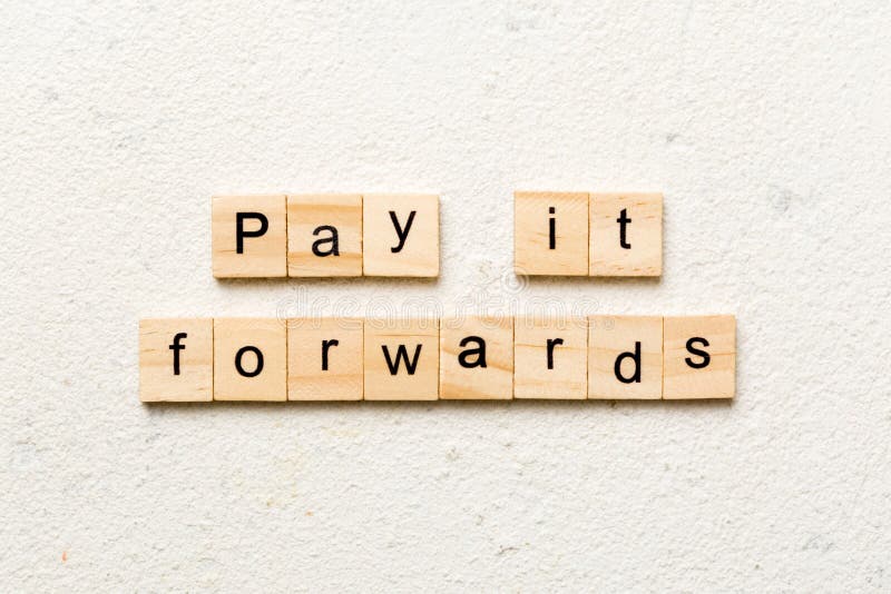 Pay it Forward Word Written on Wood Block. Pay it Forward Text on ...