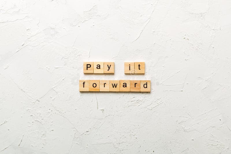 Pay it Forward Word Written on Wood Block. Pay it Forward Text on ...
