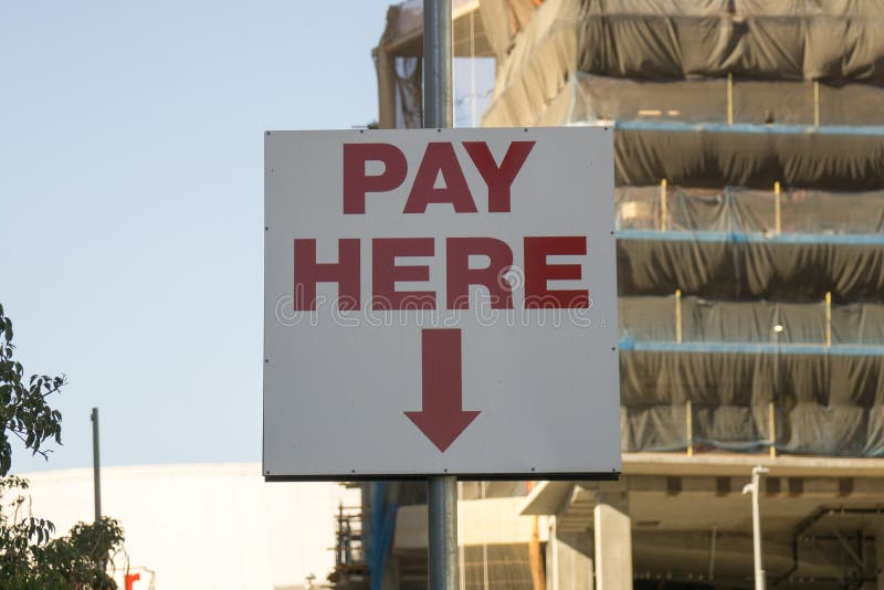Pay here parking sign editorial stock image. Image of sign - 106787779