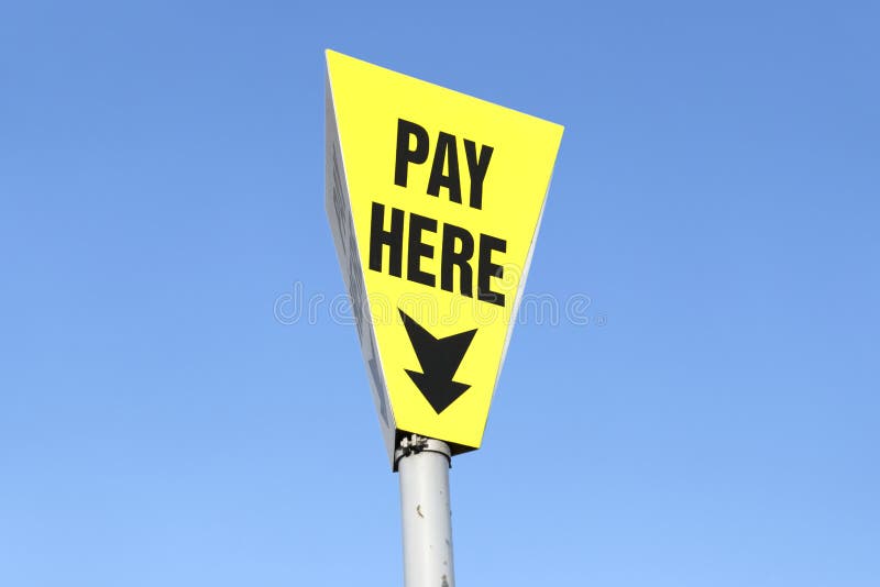 Pay Here Sign for Car Parking Against Blue Sky Stock Image - Image of ...