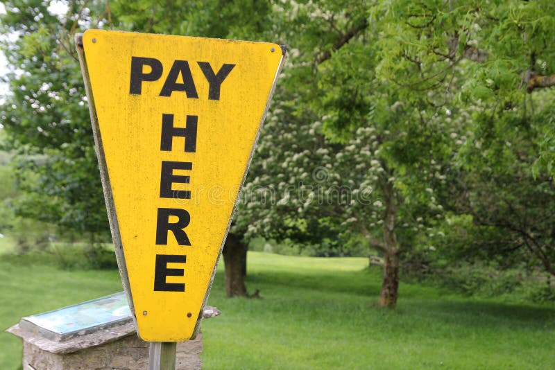 Pay here sign stock photo. Image of signboard, demand - 74617744