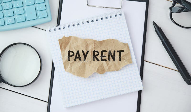 PAY RENT Text on the Notebook with Chart, Magnifier,keyboard Stock ...
