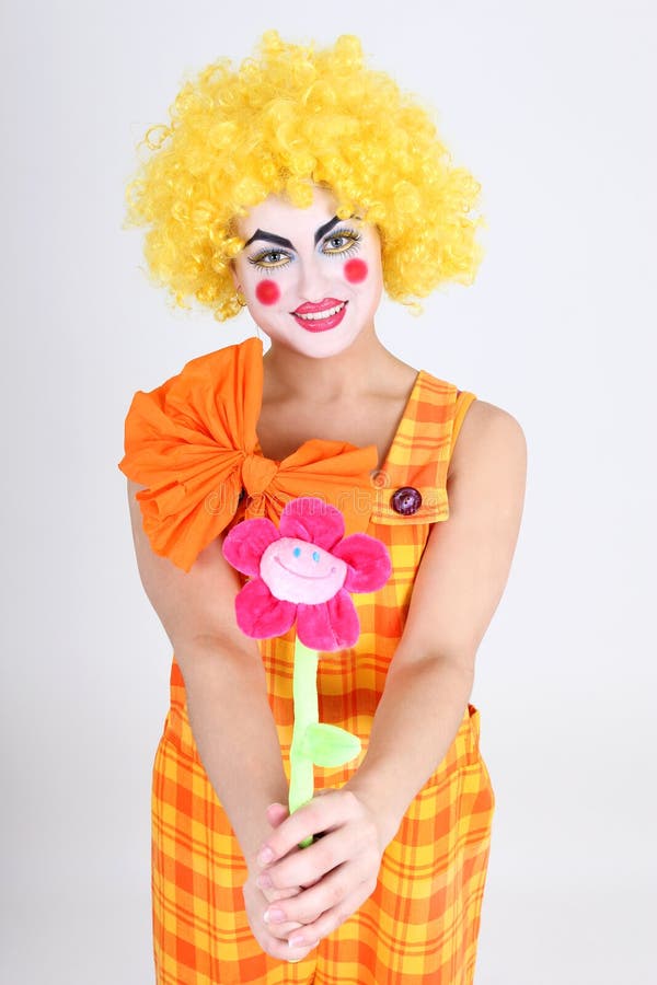 Payaso Divertido Con Una Flor Colorida Foto de archivo - Imagen de ...