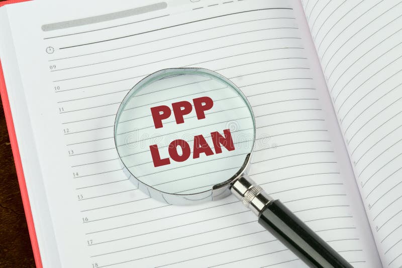 Paycheck Protection Program PPP Loan Written through a Magnifying Glass ...