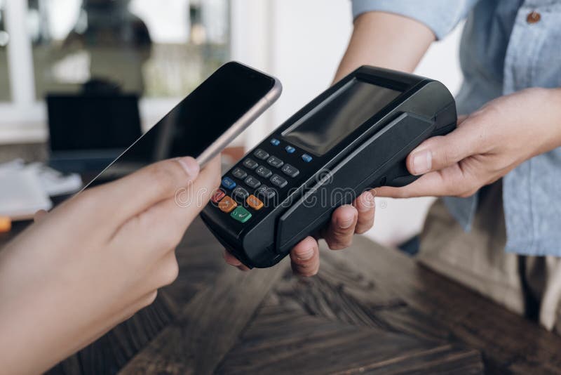Paying Bill through Smartphone Using NFC Technology Stock Image - Image ...