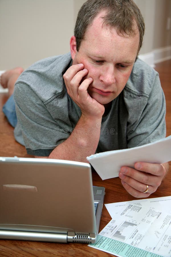 Paying Bills stock photo. Image of home, floor, confused - 4892958