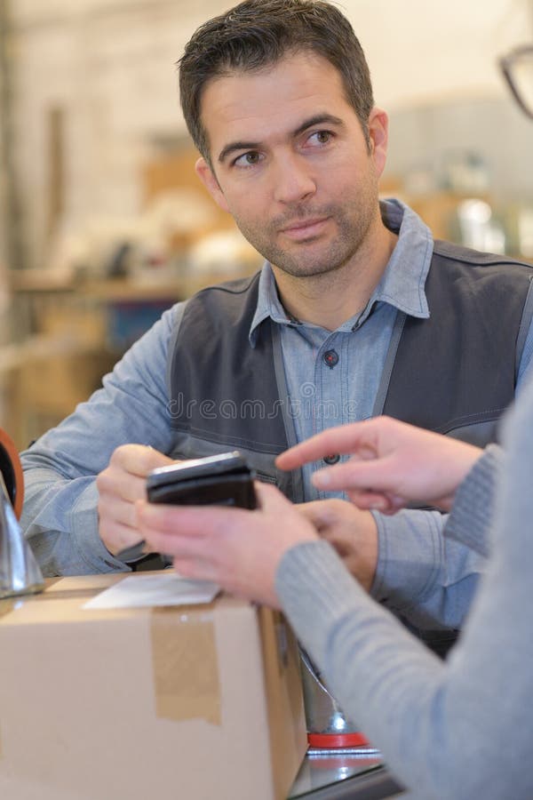 Paying in the counter stock image. Image of commercial - 117900453