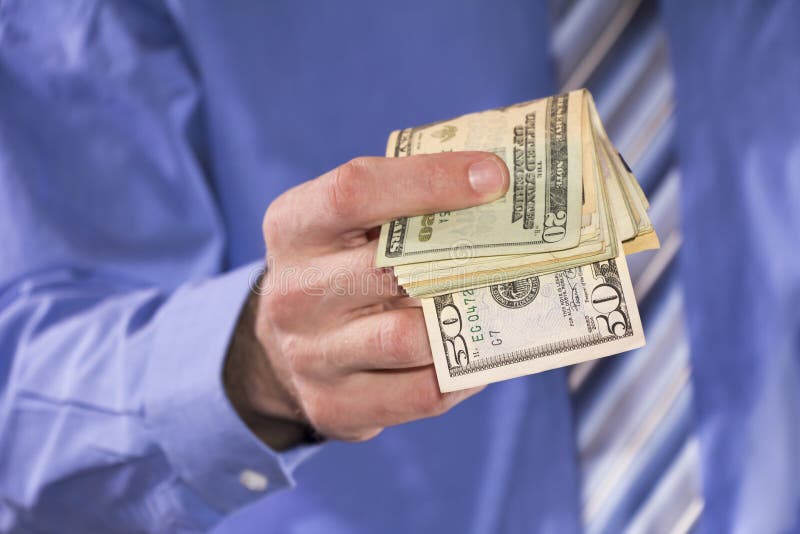 Paying in Dollars stock image. Image of finance, business - 1433259