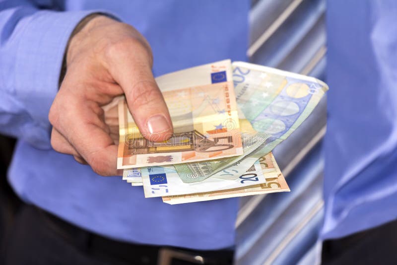 Paying in Euros stock image. Image of bribing, envelope - 53035753