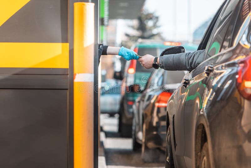 Paying for Fast Food from the Car at Drive-through Stock Photo - Image ...