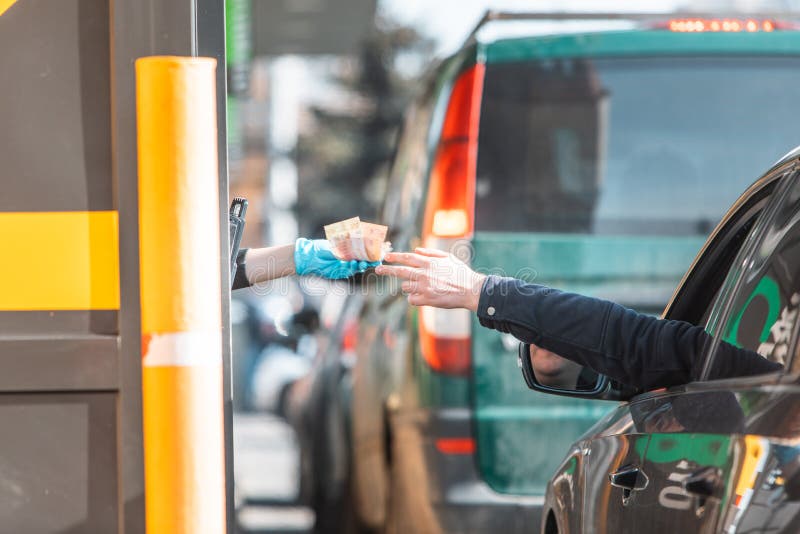Paying for Fast Food from the Car at Drive-through Stock Photo - Image ...