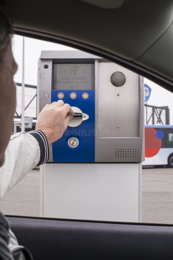 Man is Paying His Parking Using Credit Card at Parking Pay Station ...