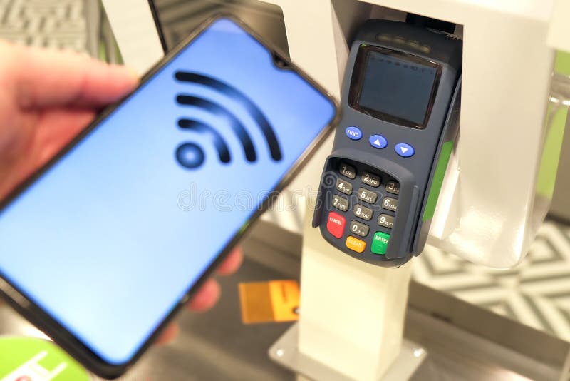 Payment by Card, in the Payment Terminal. Electronic Money. Mobile ...