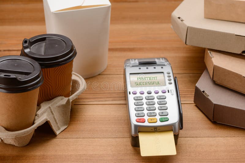 Payment Device with Inserted Card among Cups of Coffee Stock Image ...