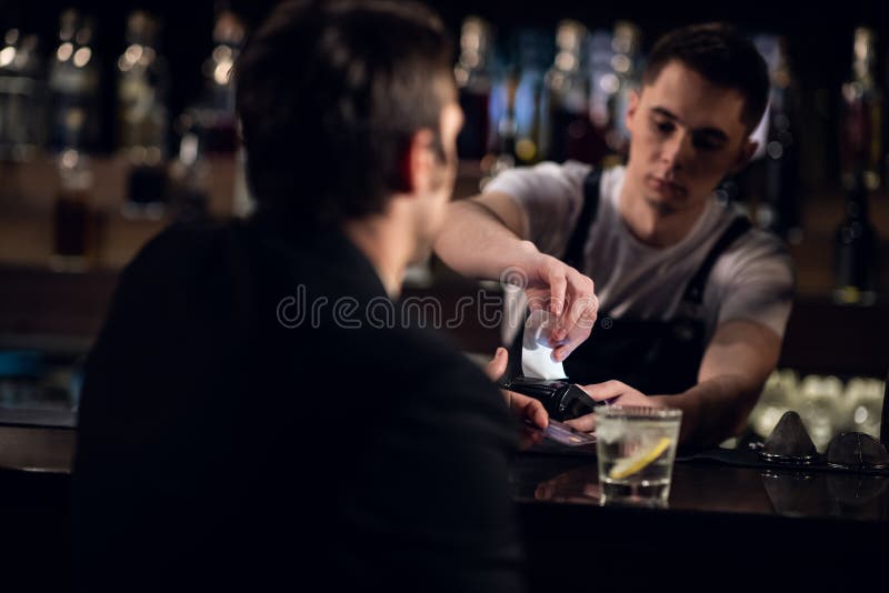 Payment for an Order in a Bar Using a Non-cash Payment Method Stock ...